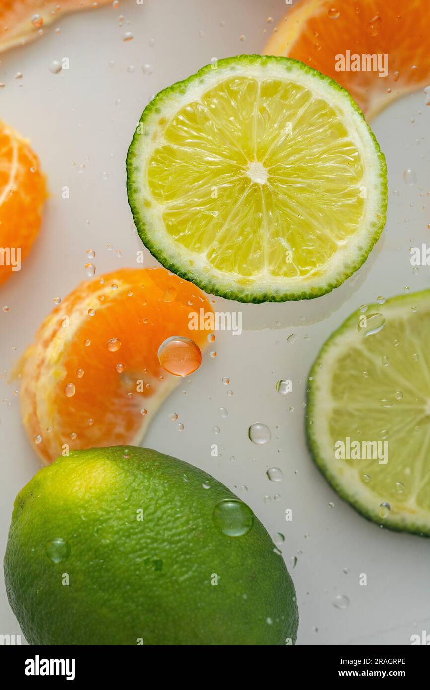 Citric fruits collage tangerine lime in a white background Stock Photo ...
