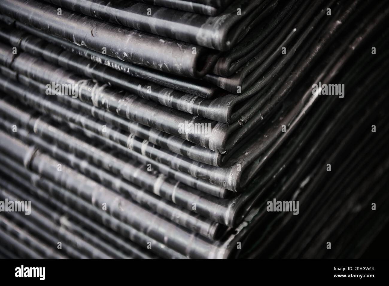 Stack of reinforced tire rubber sheets at production plant Stock Photo ...