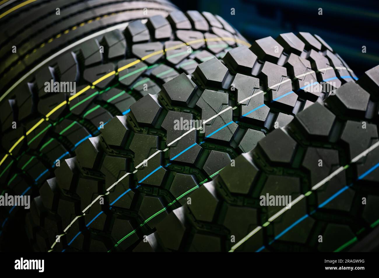 Tyres with white and blue markings after vulcanization Stock Photo - Alamy