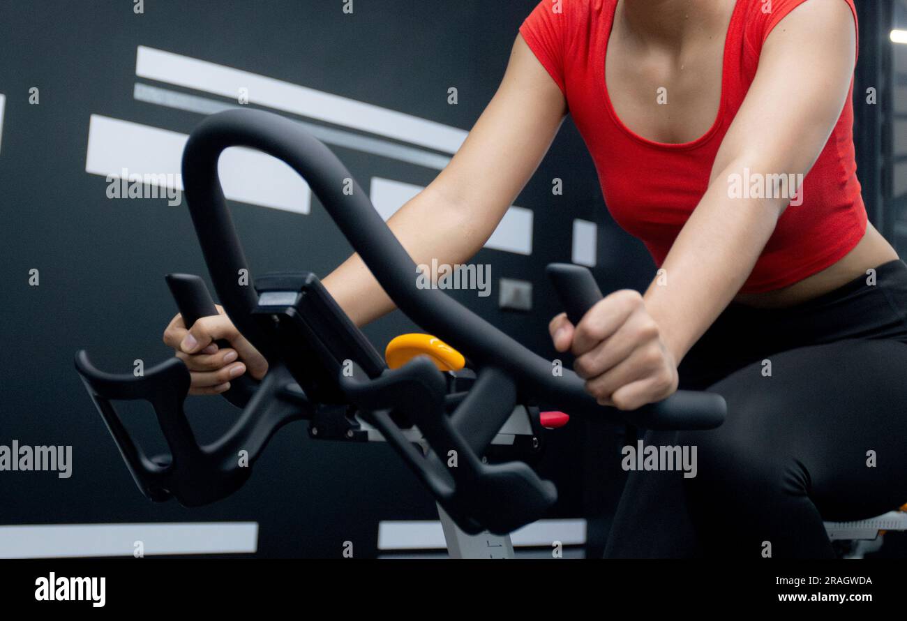 Girl riding fitness machine in hi-res stock photography and images - Alamy