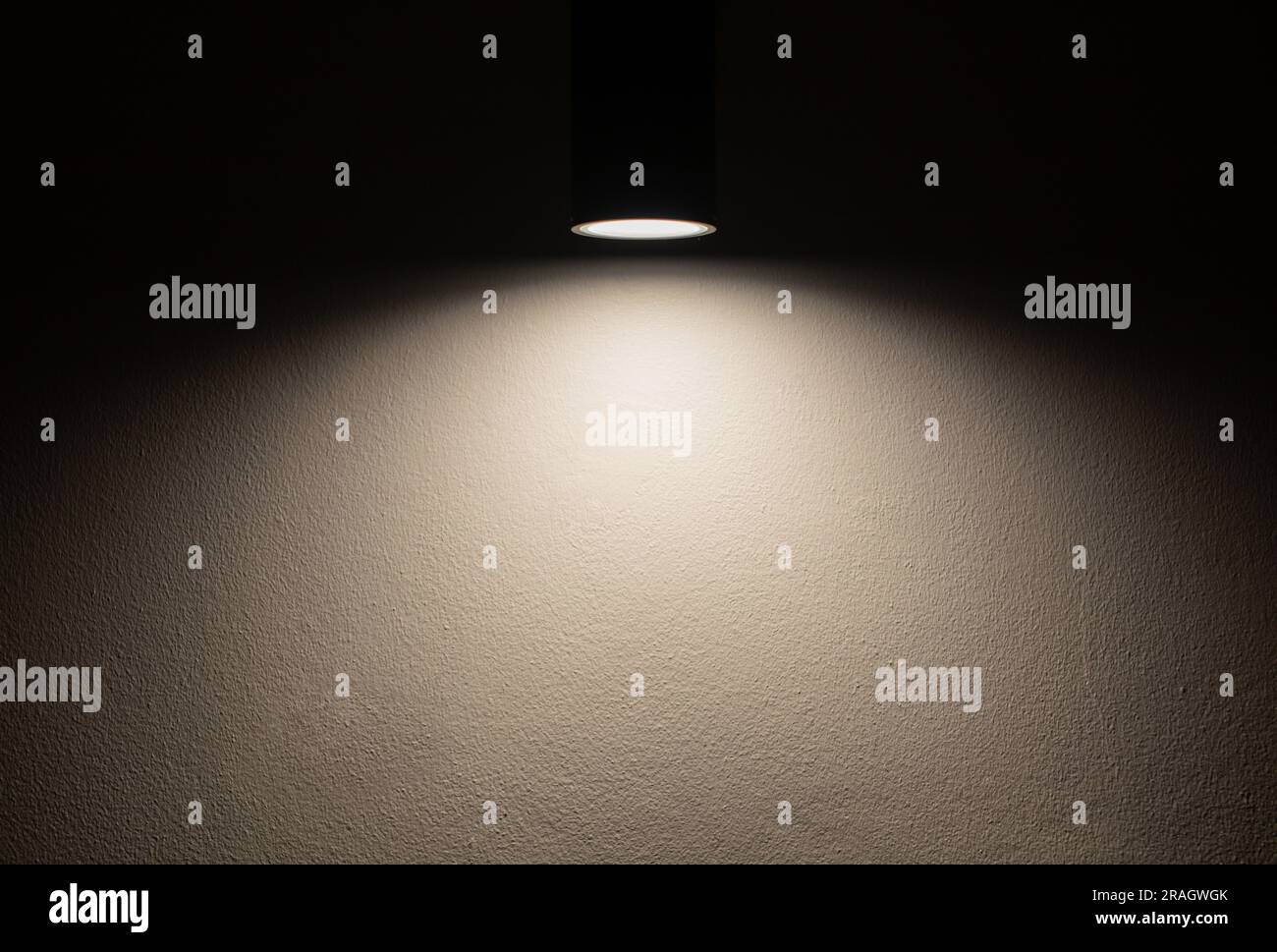 lights on white wall at night Stock Photo - Alamy