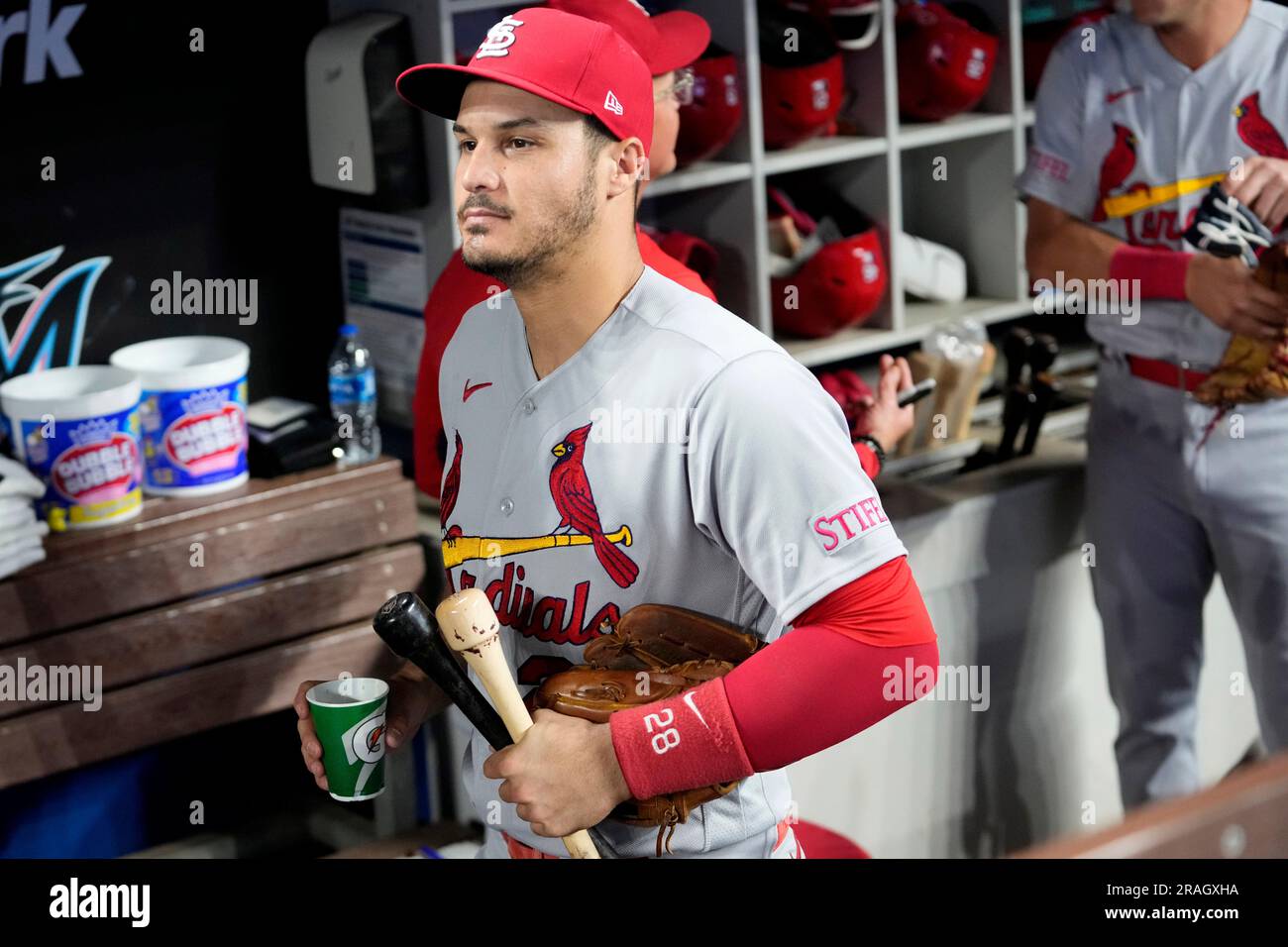 St. Louis Cardinals third baseman Nolan Arenado walks in the dugout ...