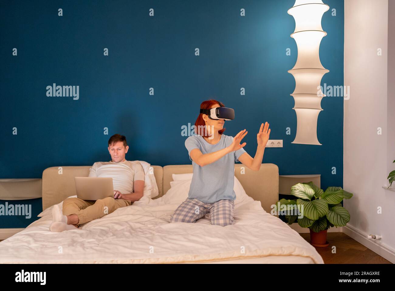 Married couple have fun with augmented virtual reality 3d glasses with ...