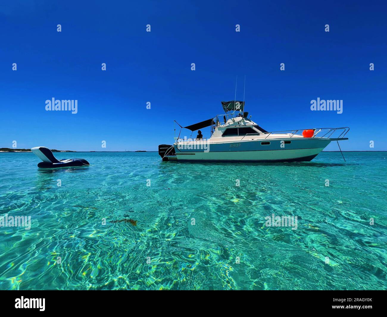Boat on Clear Blue Ocean, Parker Point, Rottnest Island Western ...
