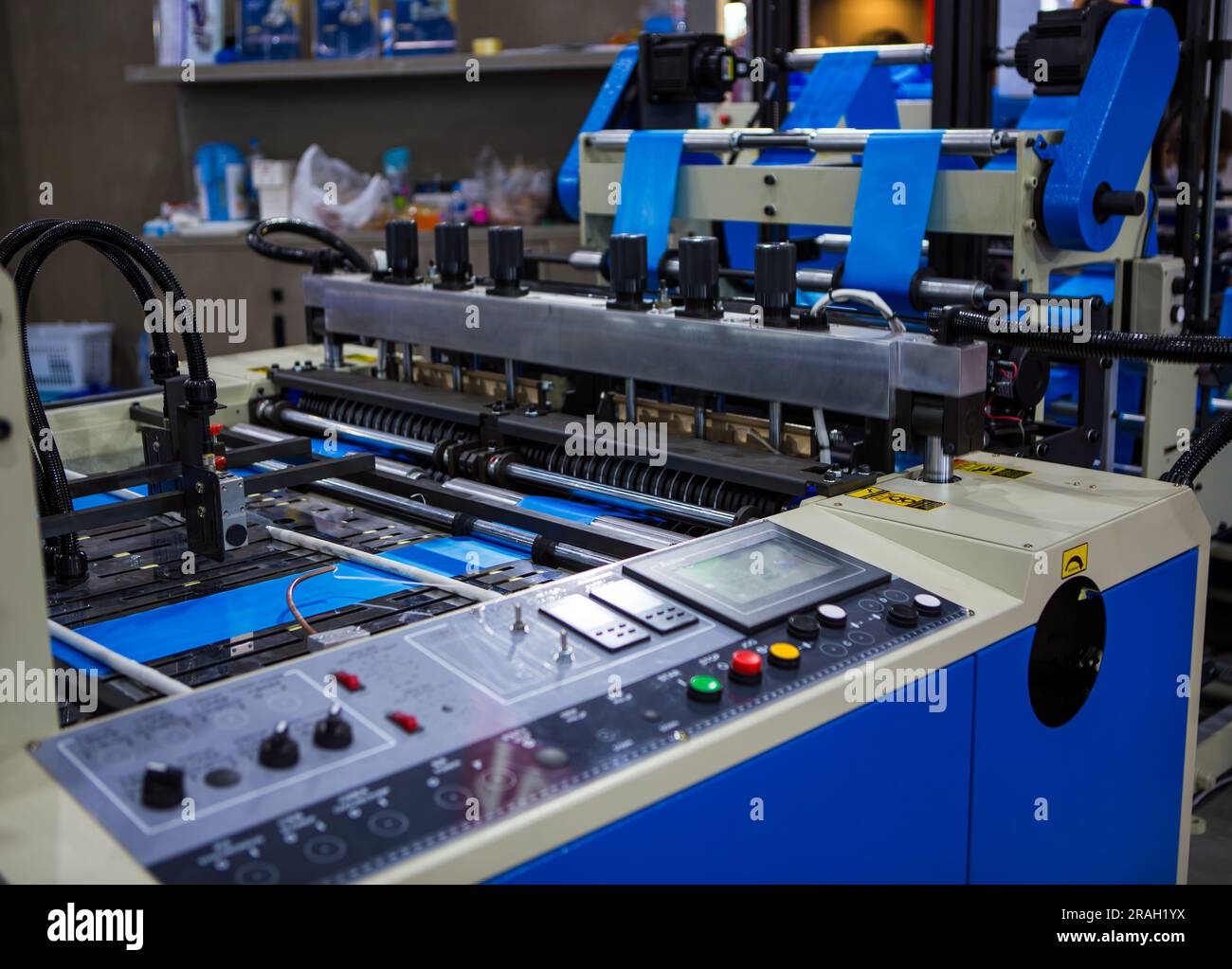 Process of plastic bag roll and cutting machine Stock Photo - Alamy