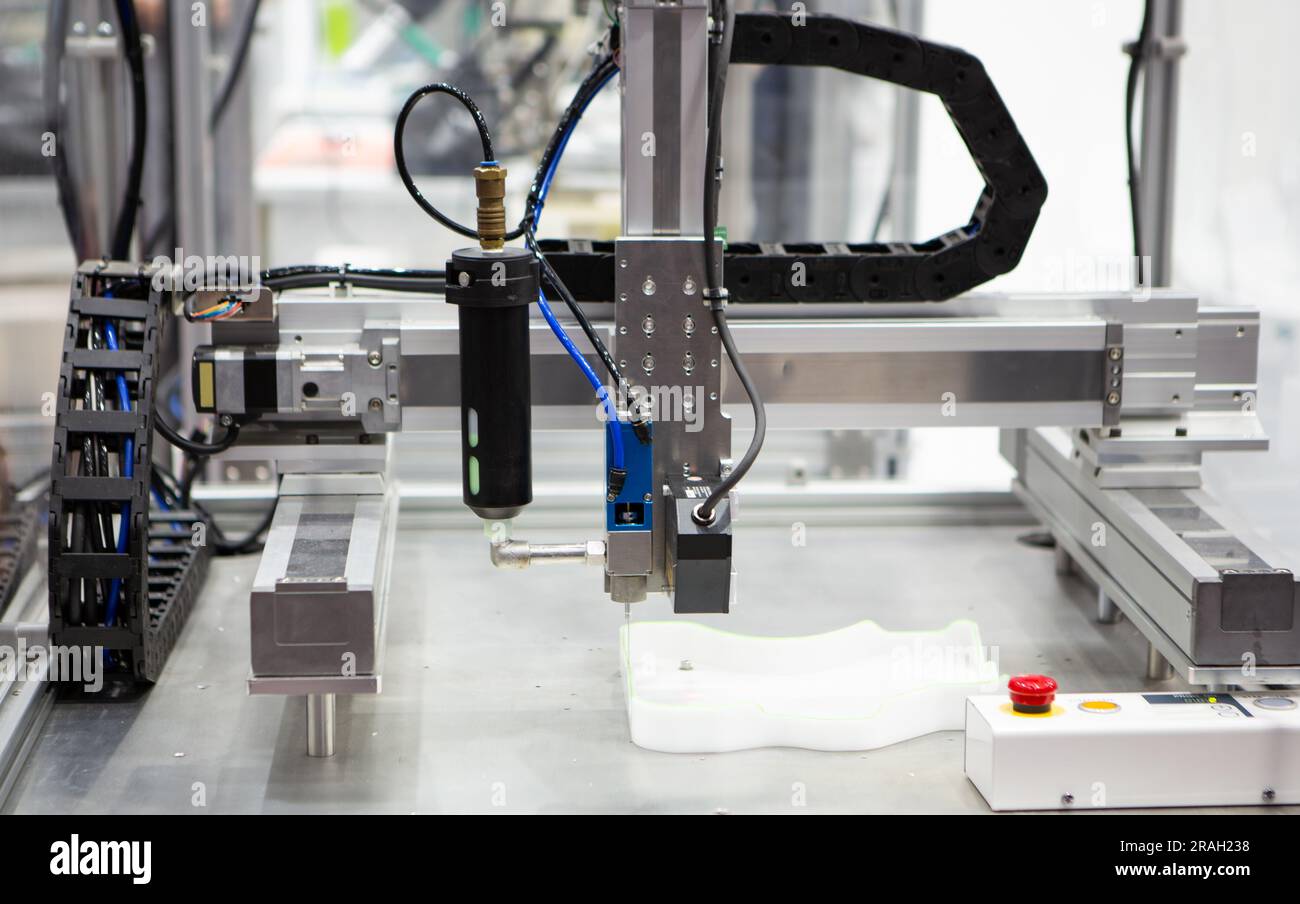 Dispensing height alignment machine. Industrial manufacture Stock Photo ...