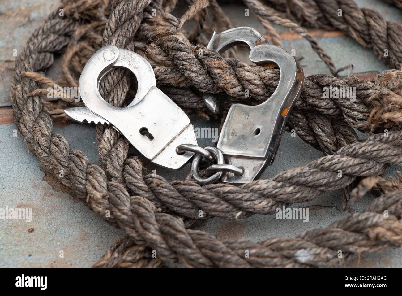 Rope handcuffs hi-res stock photography and images - Alamy