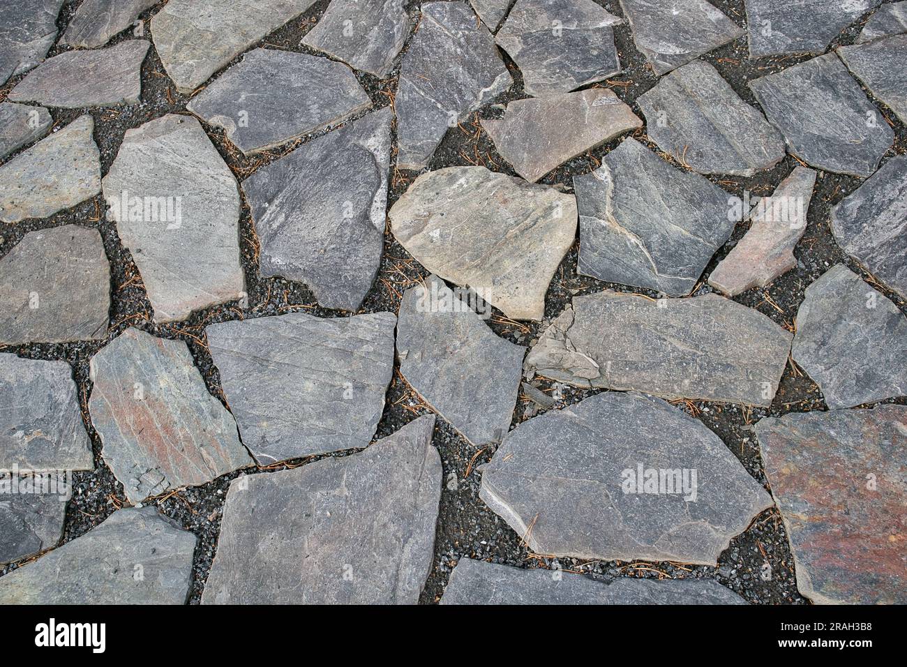 natural rough paving stones on ground Stock Photo - Alamy