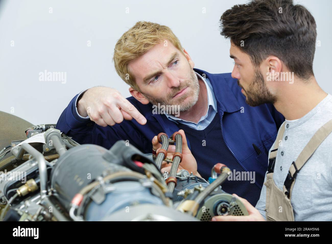 worker repairing and maintaining engine of airplane Stock Photo - Alamy