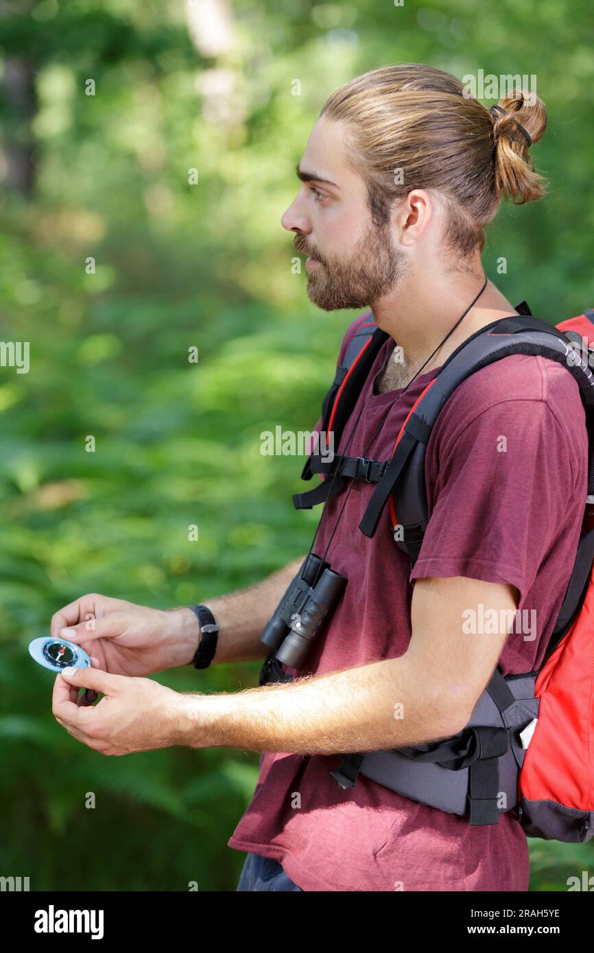 Hiker man searching direction hi-res stock photography and images - Alamy