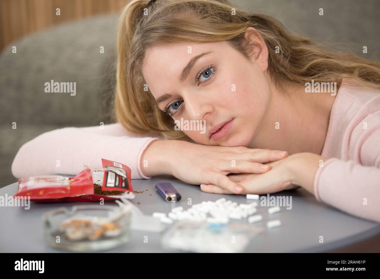 nice blond girl before smoking Stock Photo - Alamy