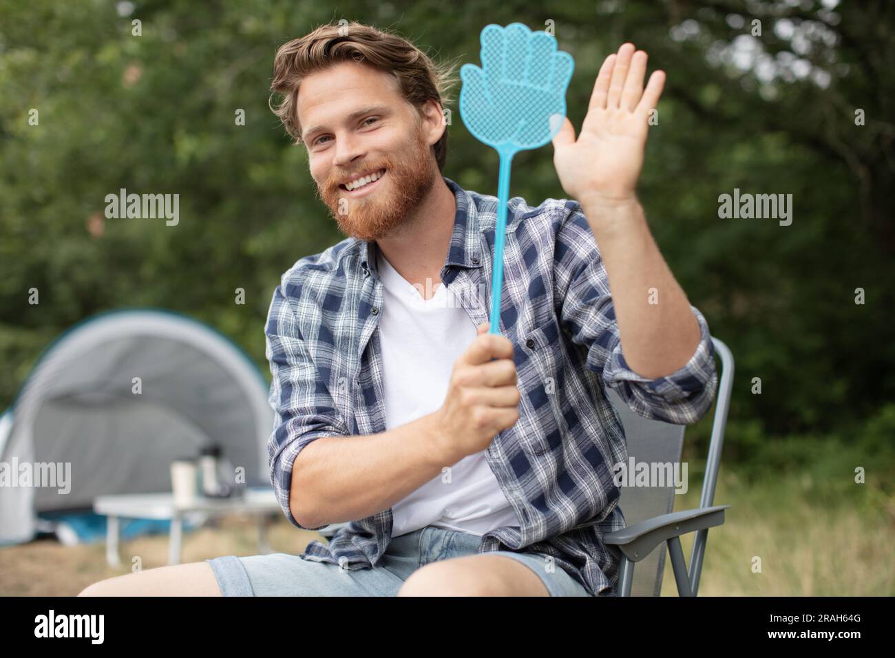 Man fly swatter hi-res stock photography and images - Alamy