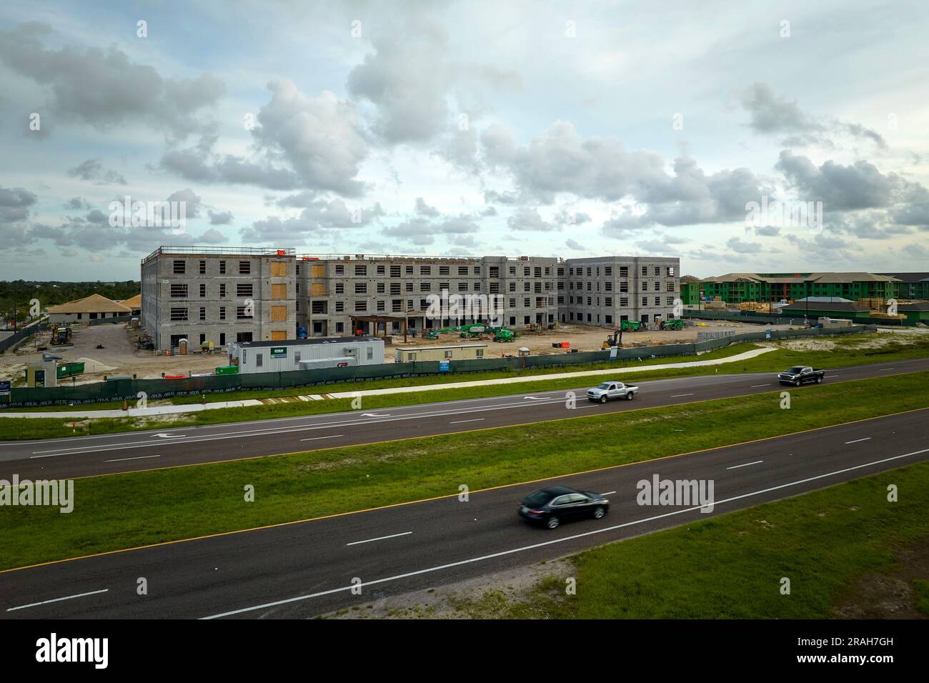 Top view of apartment buildings under construction in developing ...