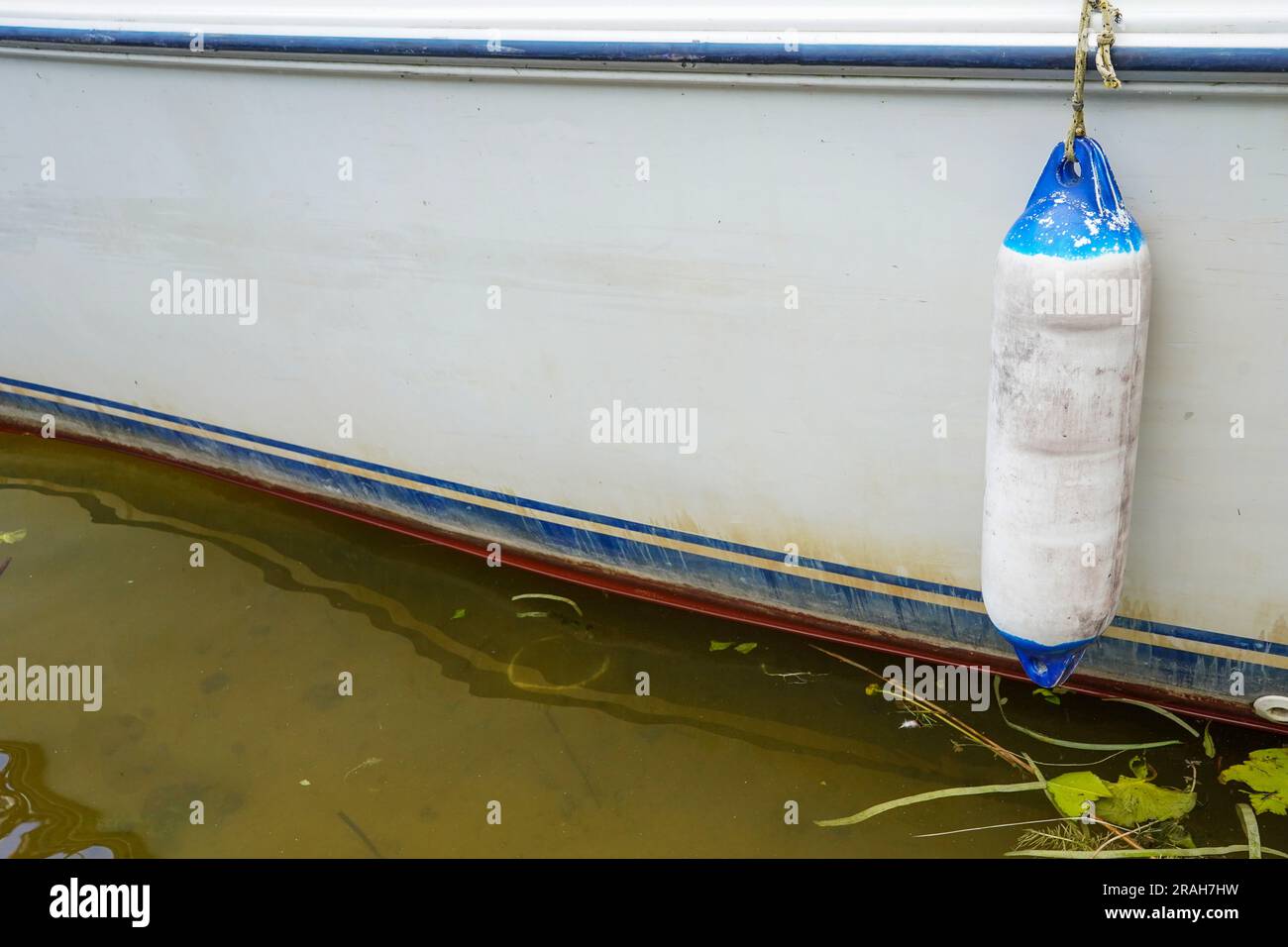 Boat on the dock with boat bumper. Dock buoy. Docking buoys Stock Photo ...