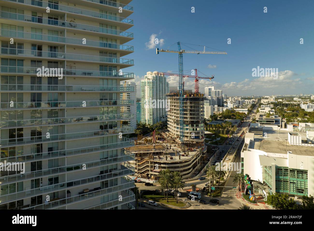 Tower lifting cranes at high residential apartment building ...