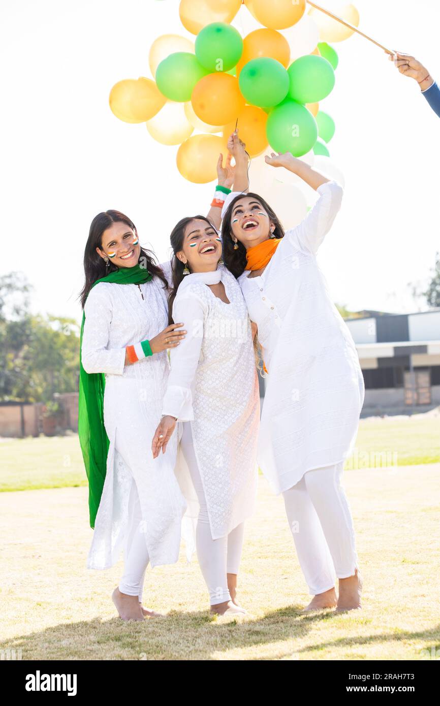 Young indian girls wearing white dress celebrating independence day or ...