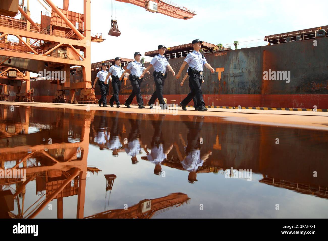CHANGZHOU, CHINA - JULY 4, 2023 - Police officers from the entry-exit ...