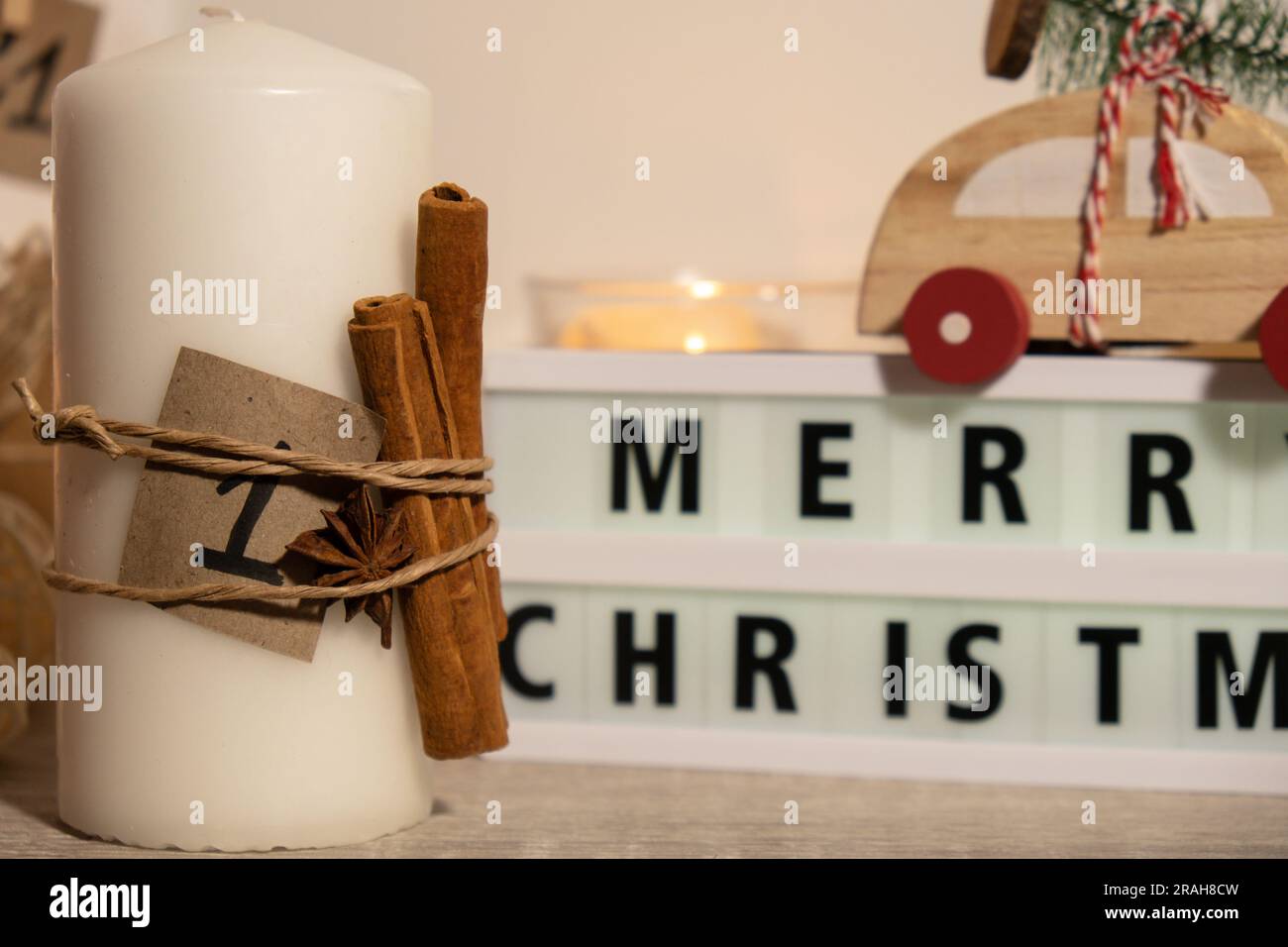 Candles with advent calendar Lightbox with text MERRY CHRISTMAS ...