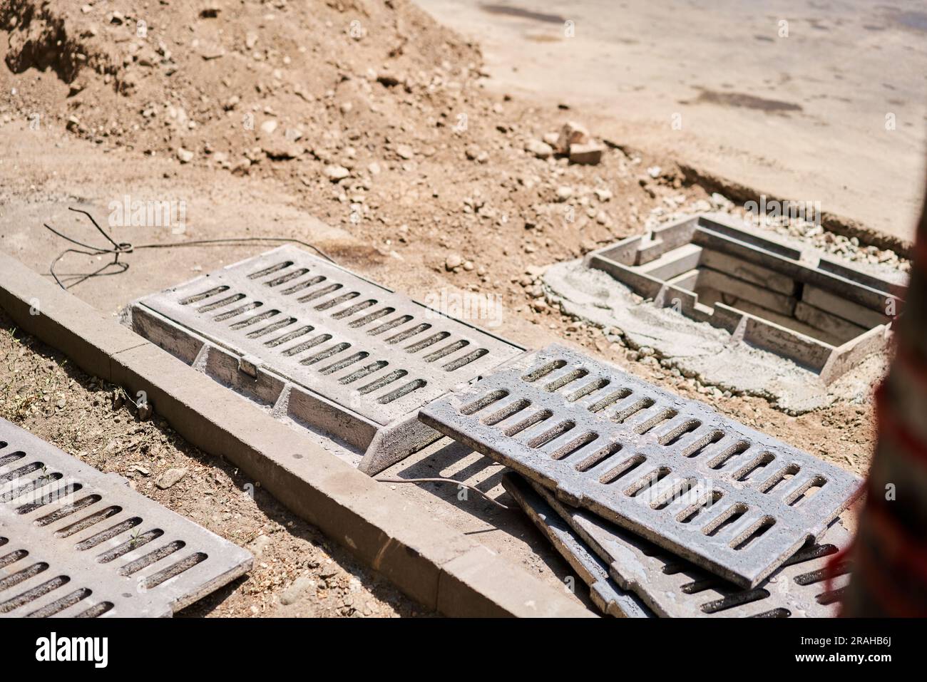 Laying concrete manholes and drain pipes for stormwater system ...