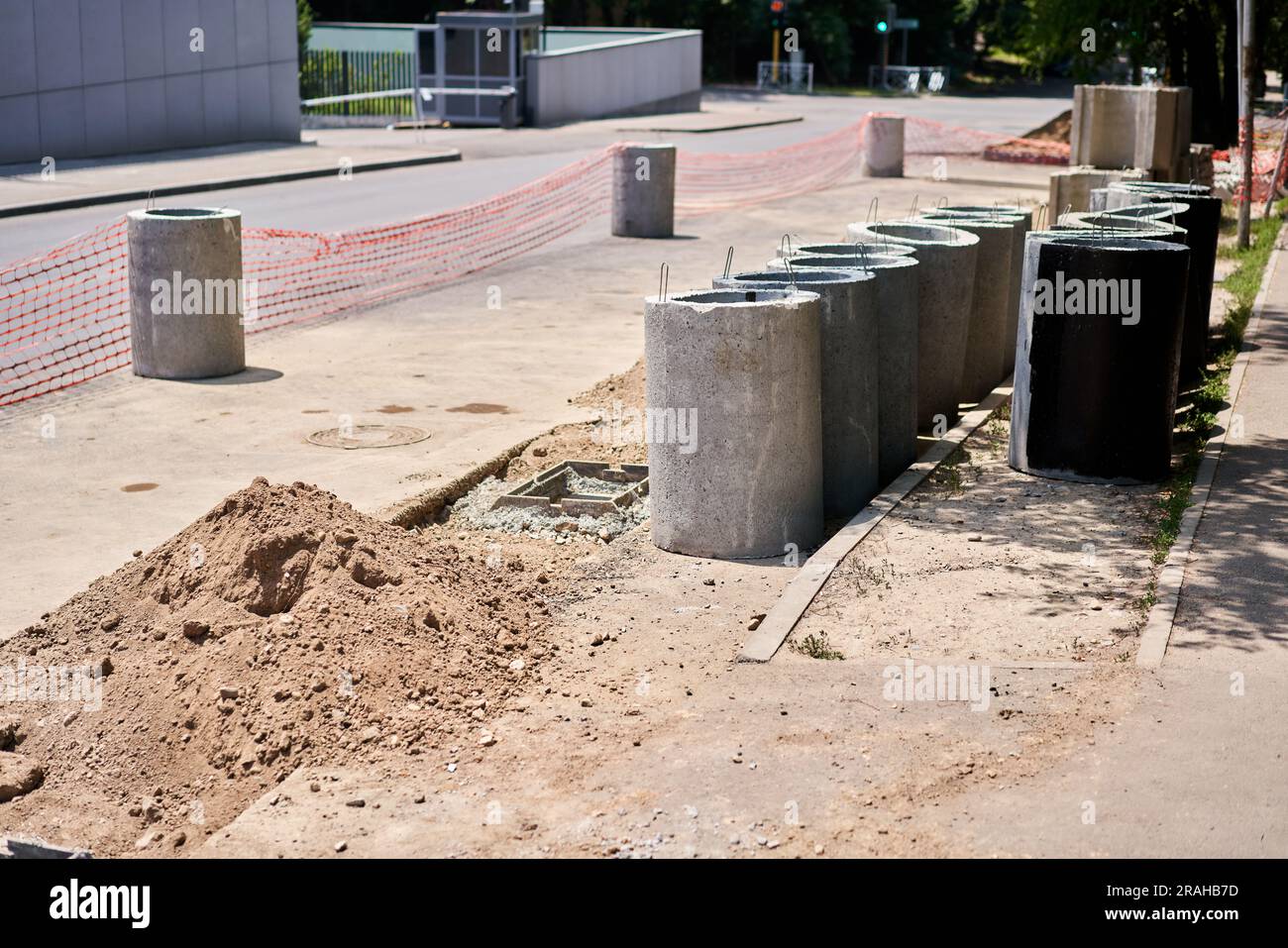 Laying concrete manholes and drain pipes for stormwater system ...