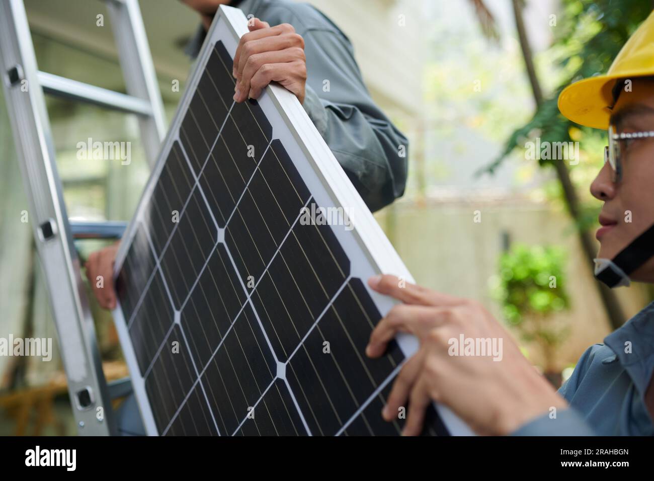 Construction workers install photovoltaic solar hi-res stock ...