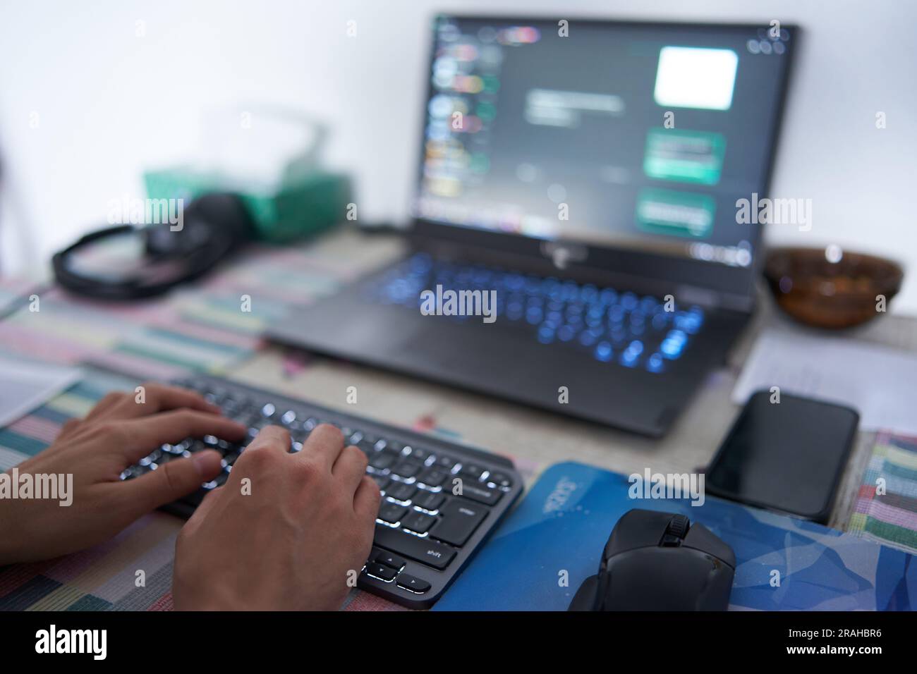 Young man software developer working from home on his laptop Stock ...