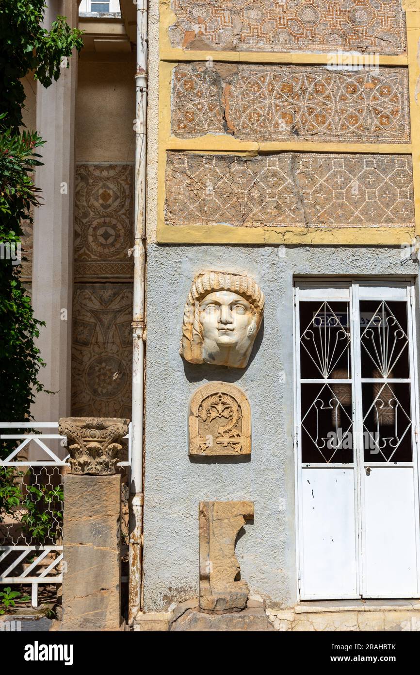 Close-up Ancient giant head statue of a Roman emperor on the Cuicul ...