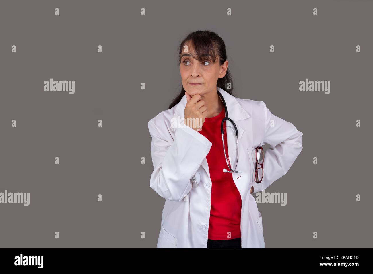 Concentrated female doctor stethoscope hi-res stock photography and ...