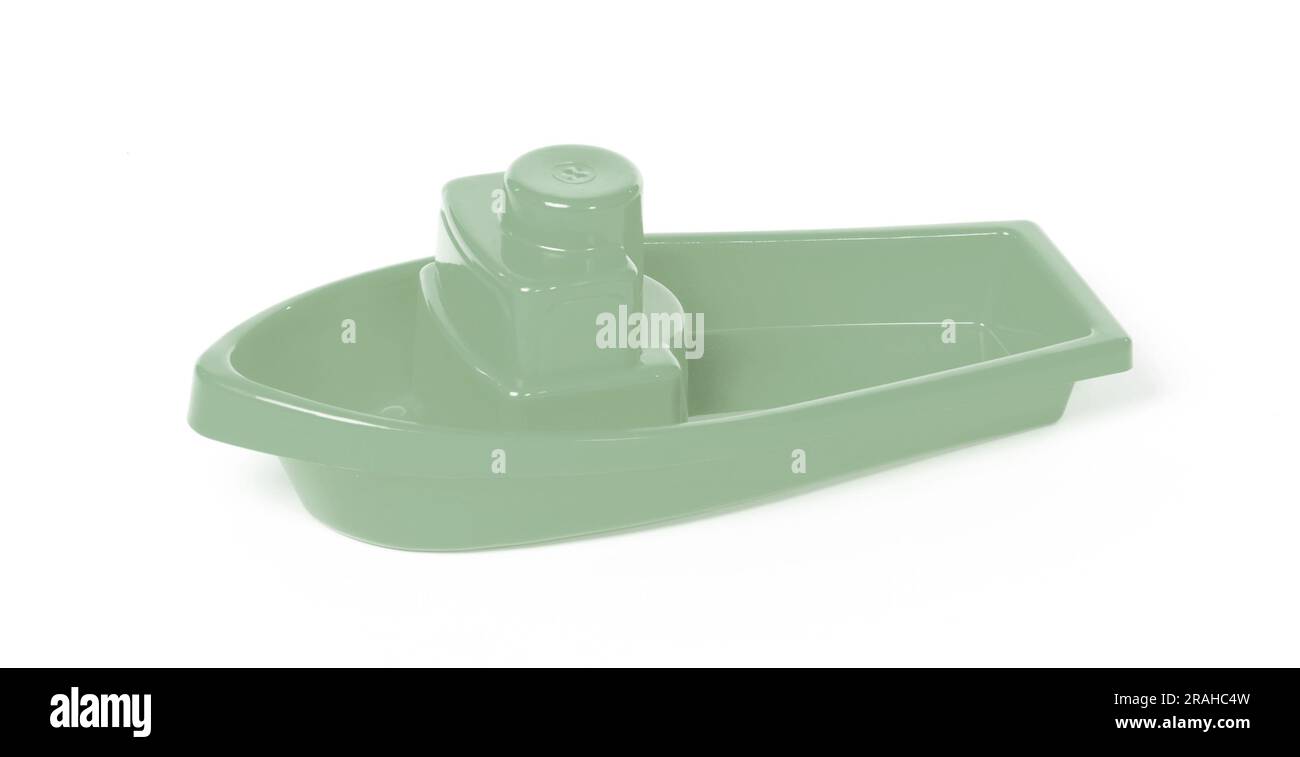 Plastic toy boat isolated on a white background Stock Photo - Alamy