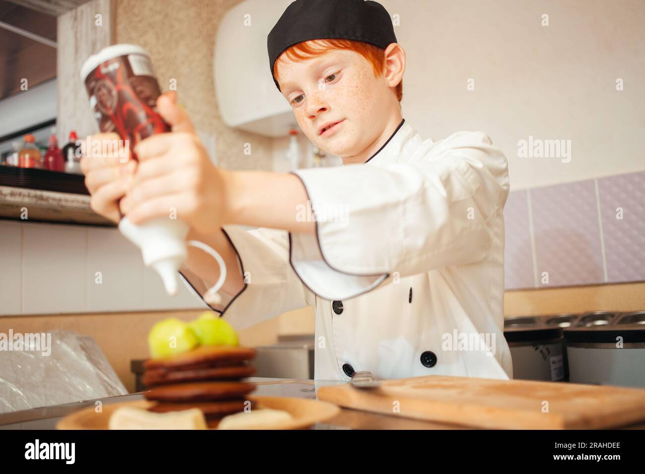 Chef pours chocolate dough baking hi-res stock photography and images ...