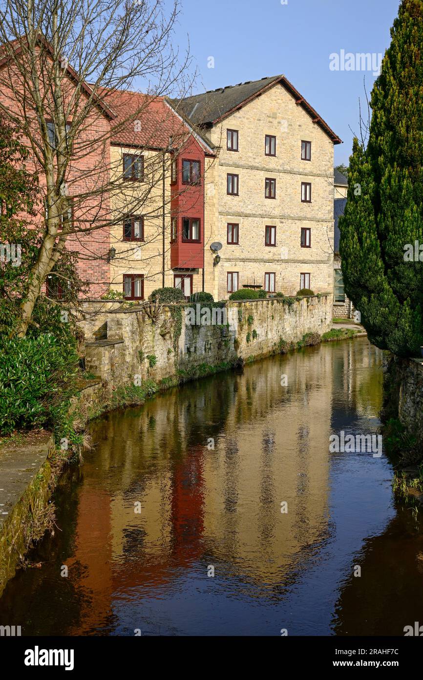 Mill House in Pickering town reflected in the still waters of Pickering ...