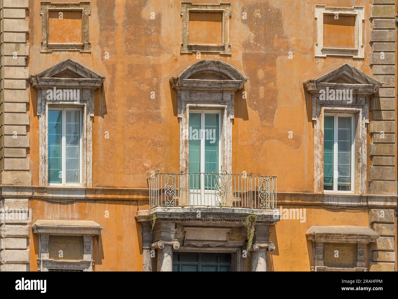 Old Building with a renaissance windows and balcony Stock Photo - Alamy