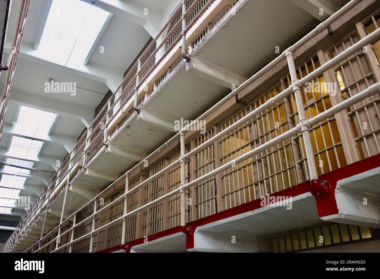 Inside Alcatraz Federal penitentiary looking up at corridors with ...
