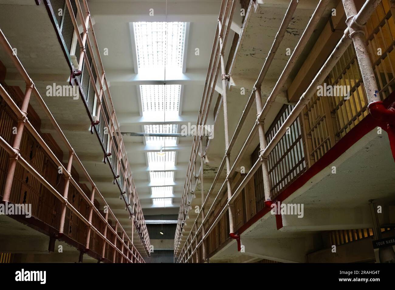 Inside Alcatraz Federal penitentiary looking up at corridors with ...