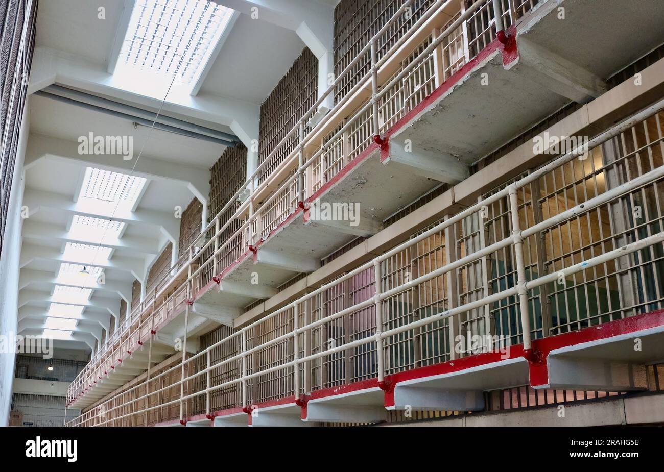 Inside Alcatraz Federal penitentiary looking up at corridors with ...