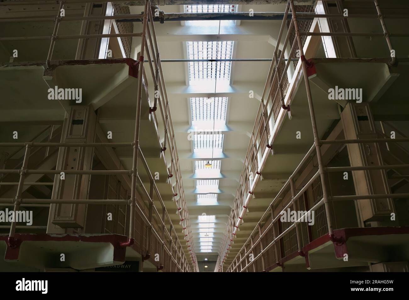 Inside Alcatraz Federal penitentiary looking up at corridors with ...