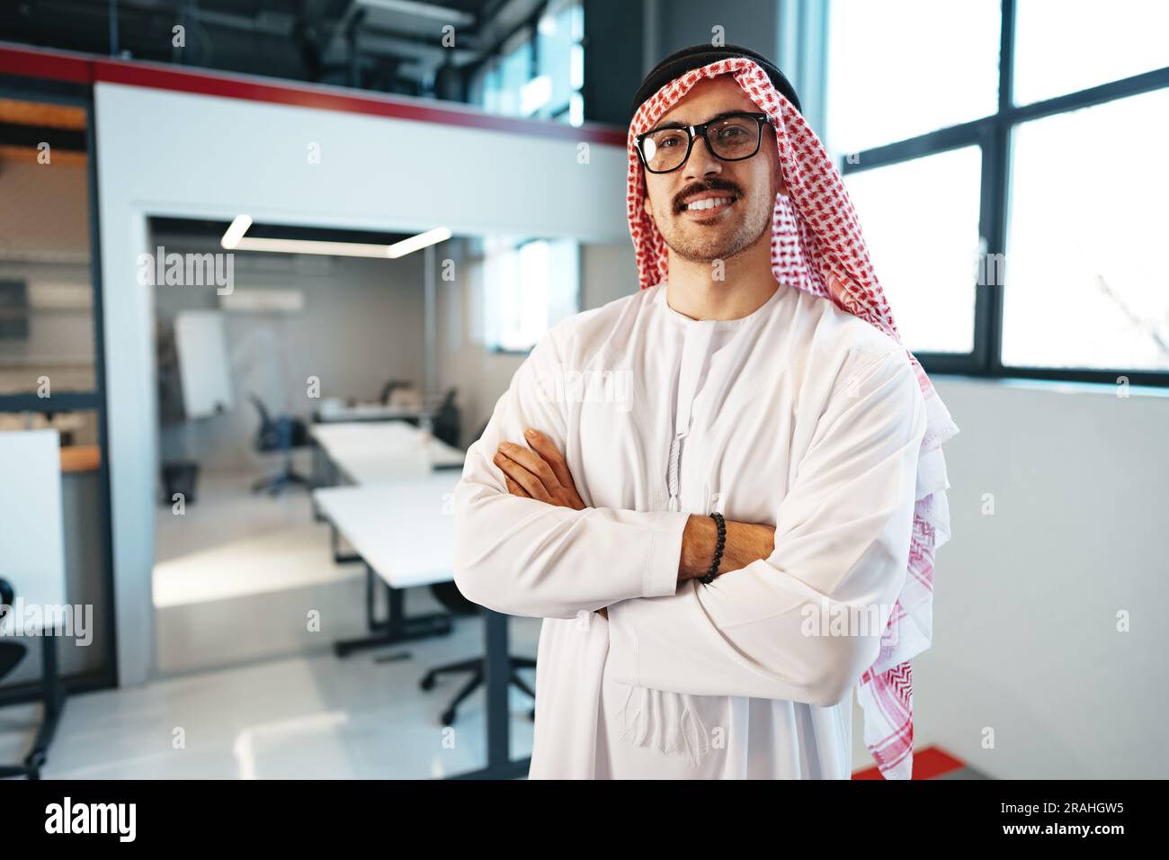 Successful muslim businessmen in traditional outfit in his office Stock ...