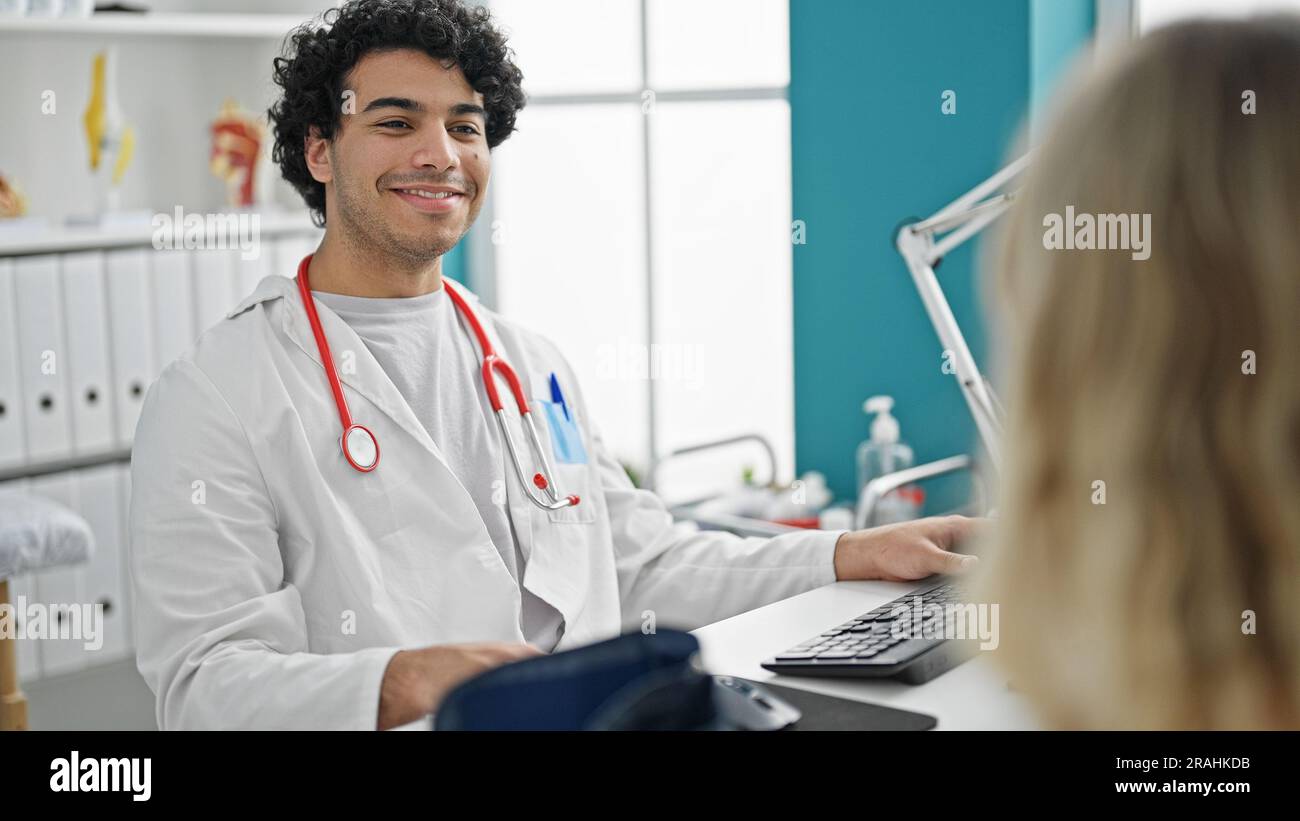 Young latin doctor having hi-res stock photography and images - Alamy