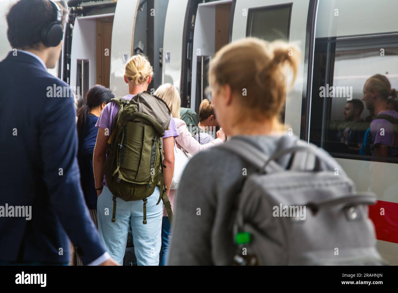 Passengers board an ICE (Inter City Express, Germany) train at Mannheim, Germany main station ...