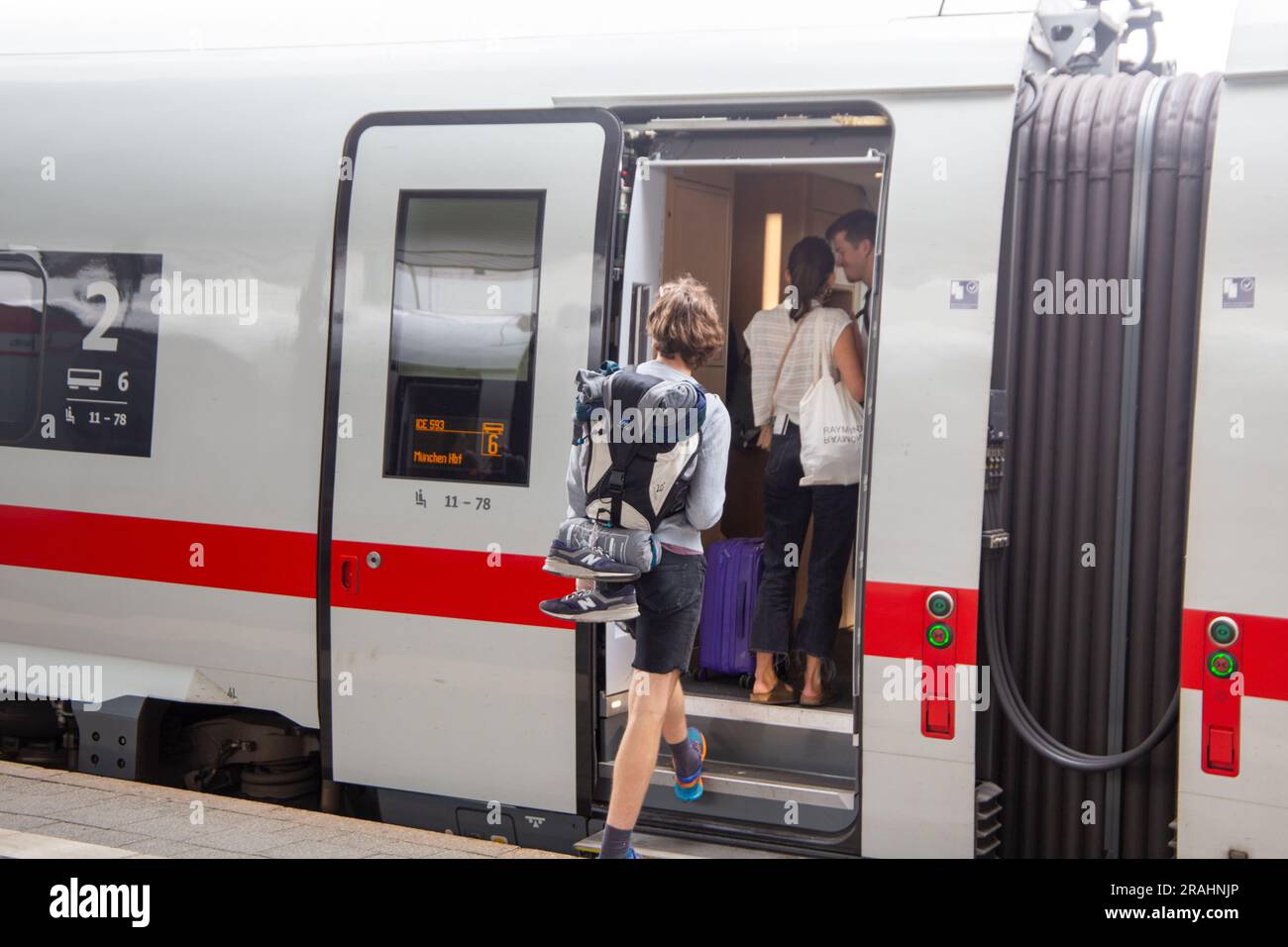 Passengers board an ICE (Inter City Express, Germany) train at Mannheim, Germany main station ...