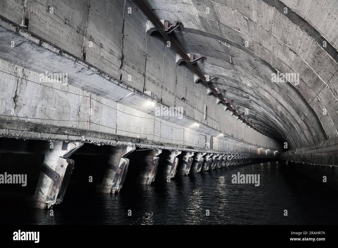 Industrial concrete tunnel perspective, part of abandoned underground ...