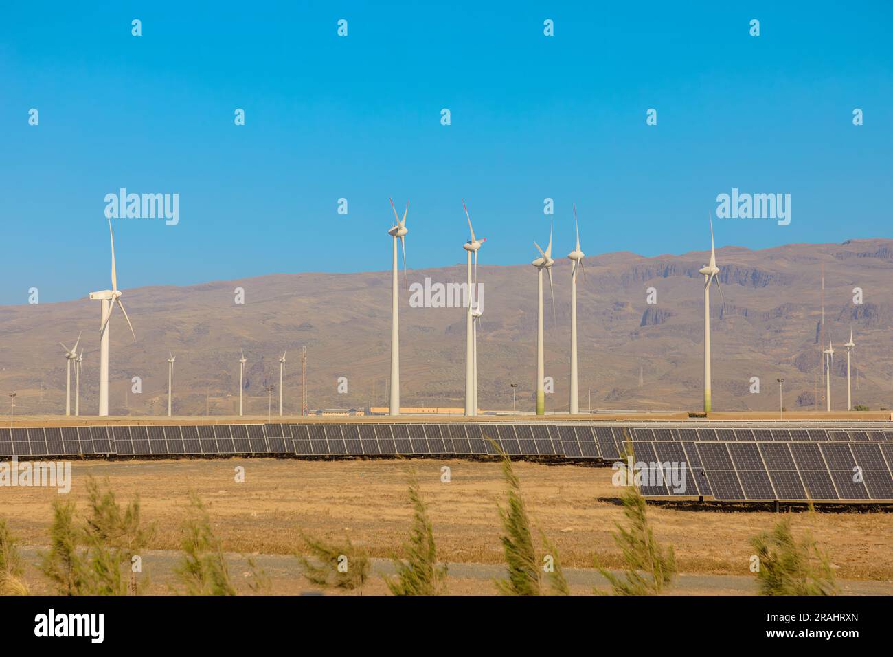 power plant with Wind Turbines and Solar Panels to harnessing Nature's ...