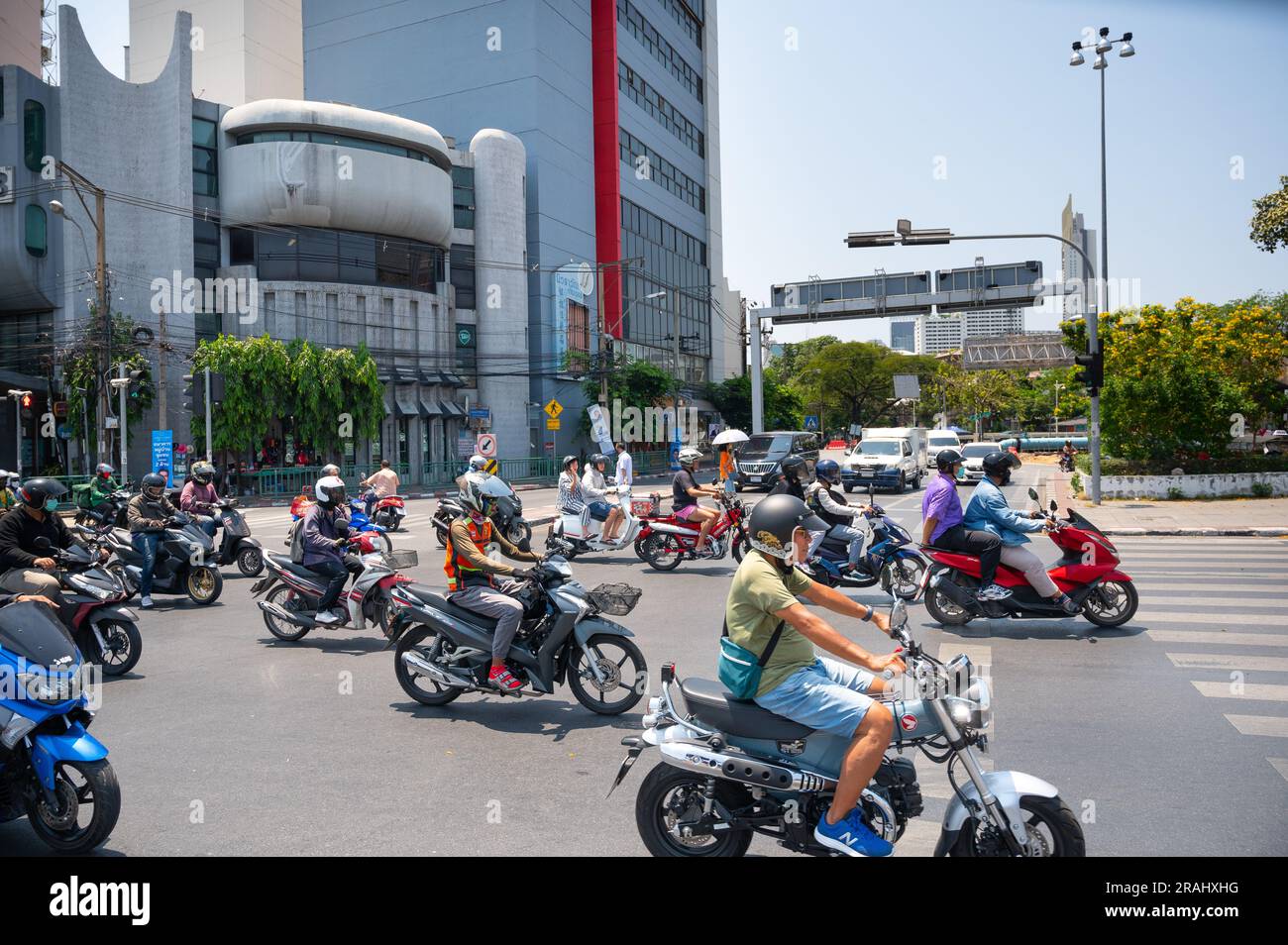 Scooters and motorbikes are one of the most common modes of transport in Bangkok Stock Photo - Alamy