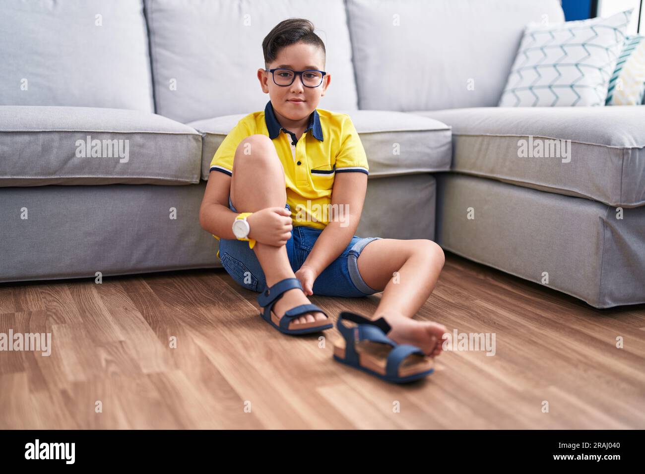 Boy wearing slippers hi-res stock photography and images - Alamy