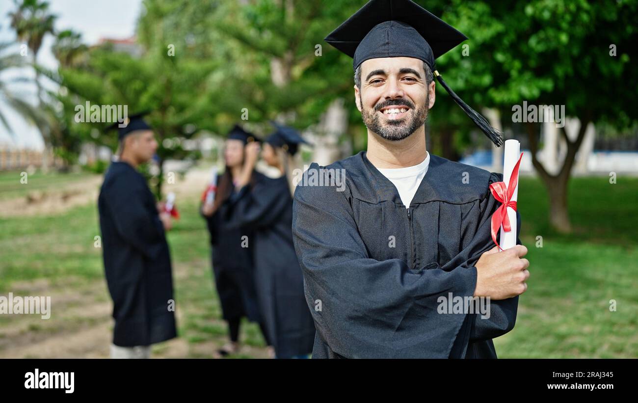 Group of people students graduated holding diploma standing with arms ...