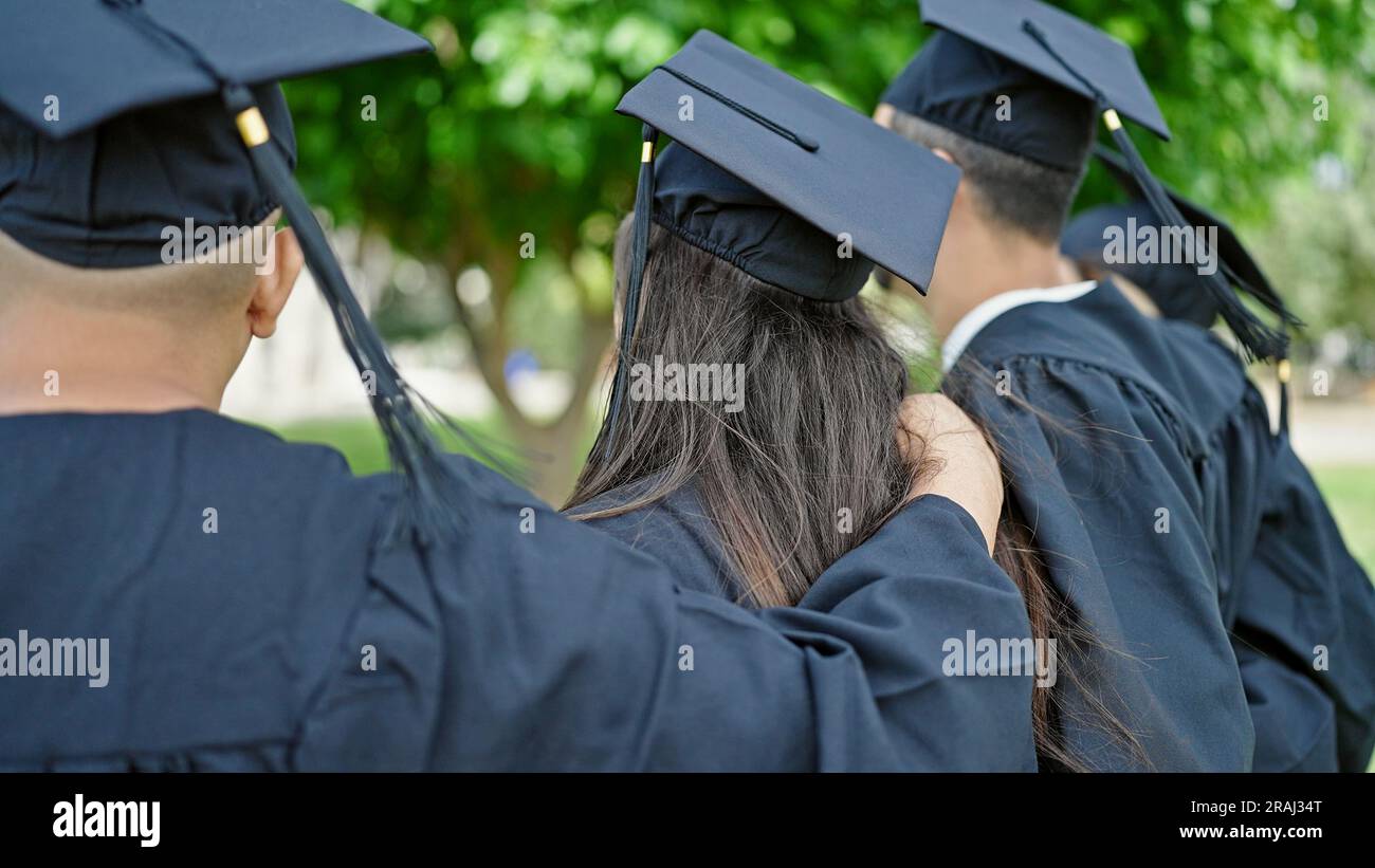 Group of people students graduated hugging each other backwards at ...