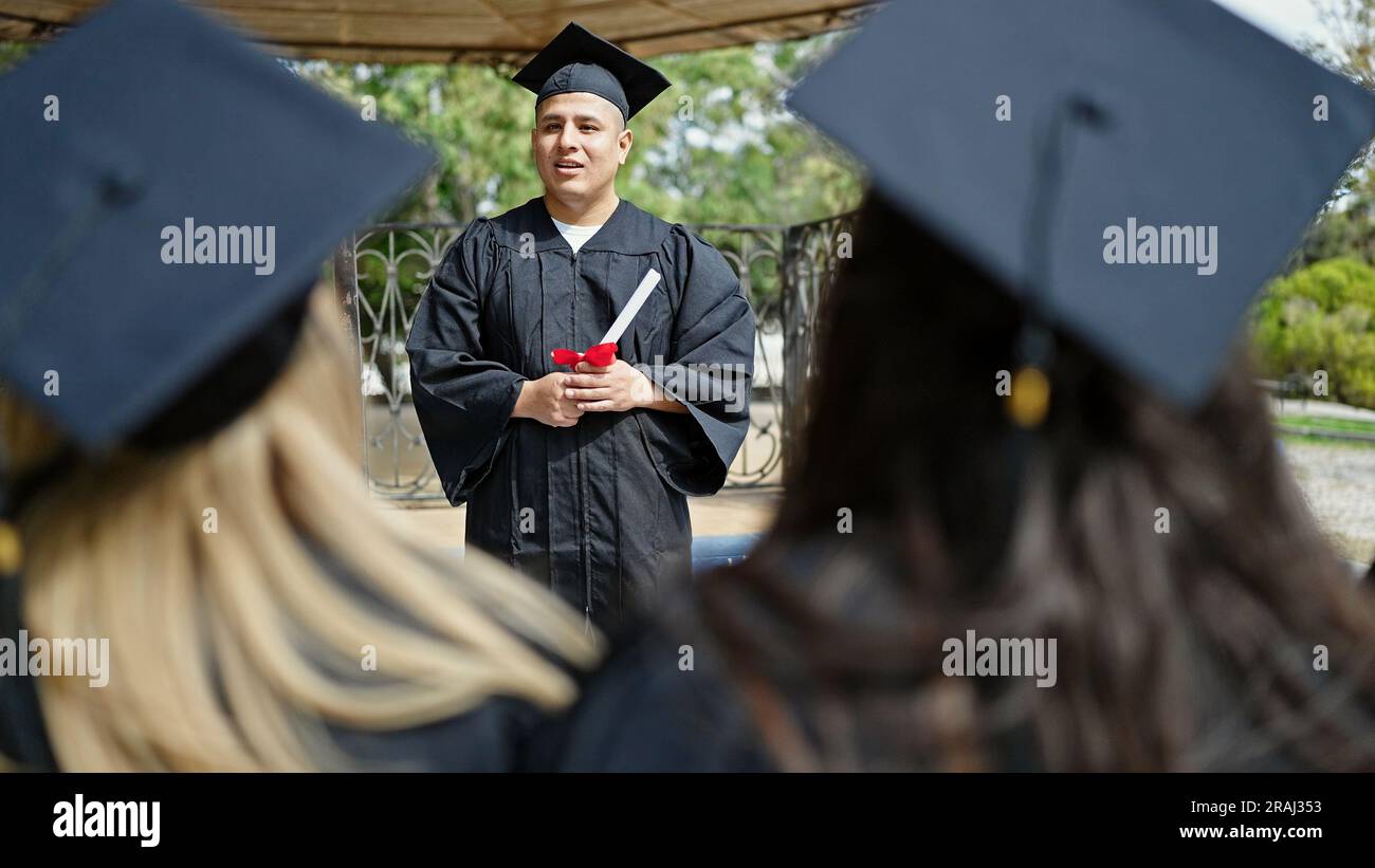 Group of people students graduated telling speech at university campus ...