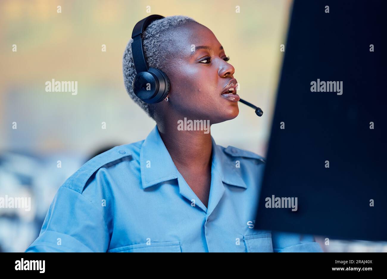 Security dispatch, communication headset and black woman talking ...