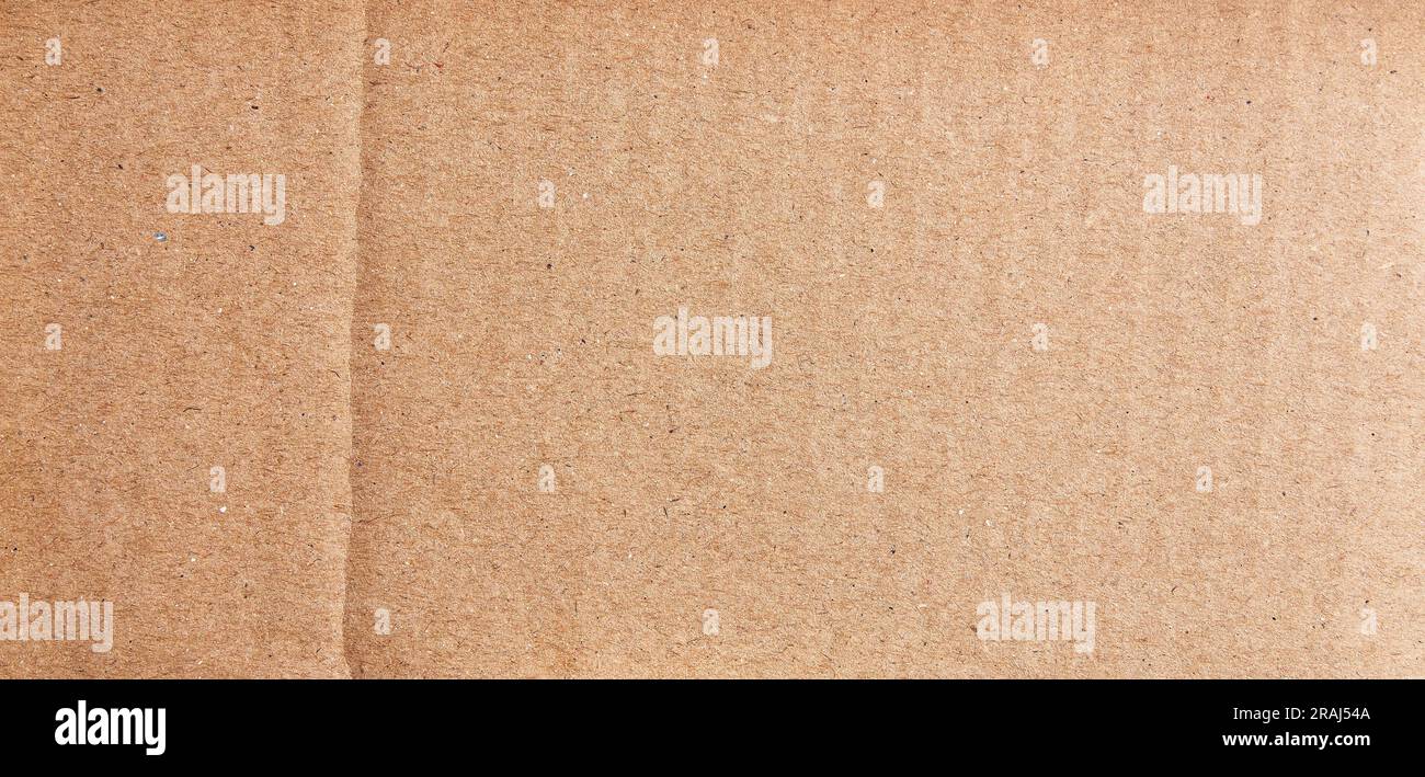 Brown cardboard carton material texture background Stock Photo - Alamy