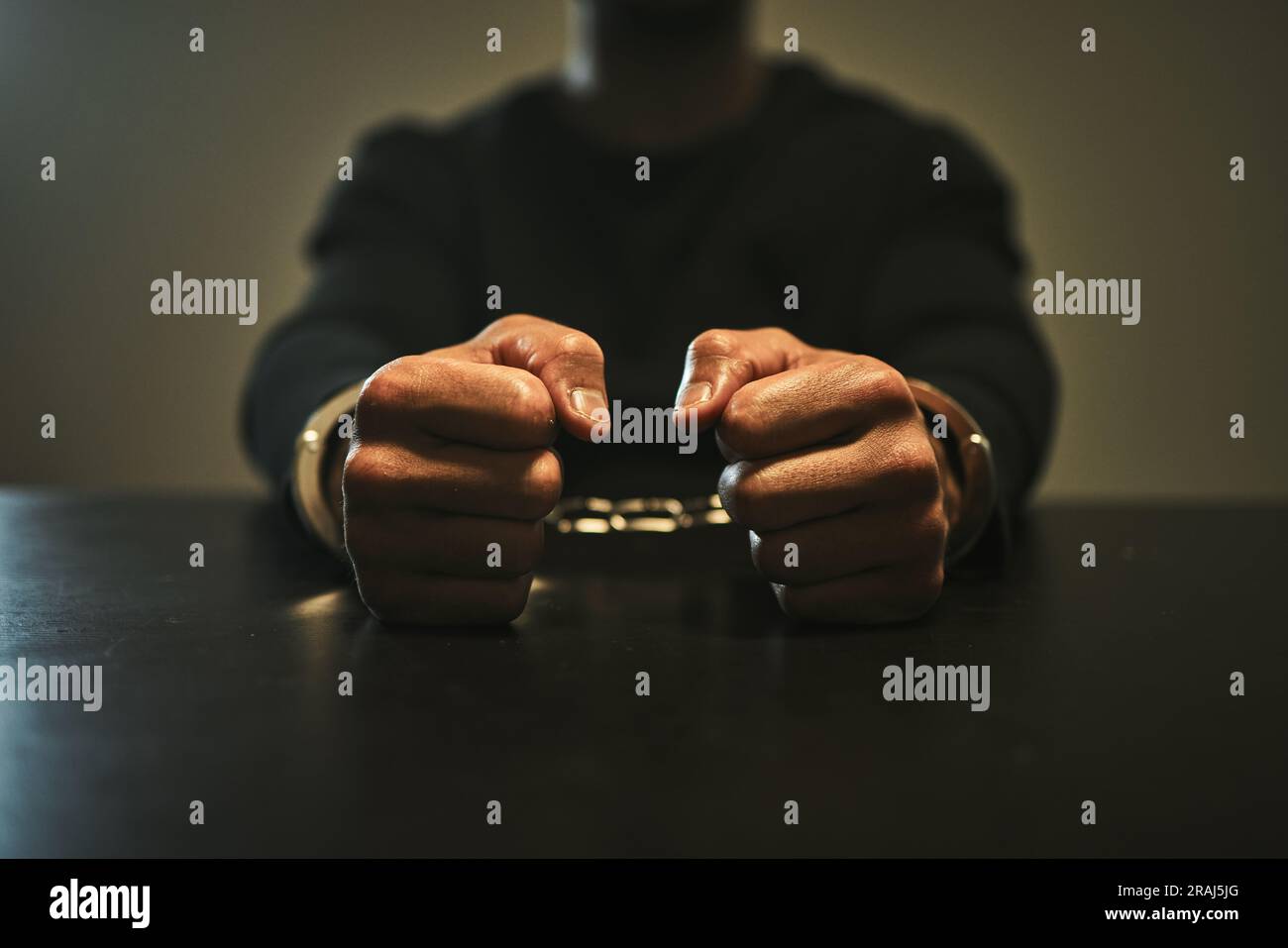 Interrogation, jail and hands of criminal in handcuffs for interview ...